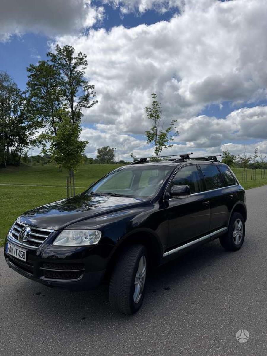 Black Volkswagen Touareg 2006 in Vilnius, with an engine capacity of 2.97 L and mileage of 270 thousand km for 4950 €, photo 5 on AUTOMOTO.COM.LV