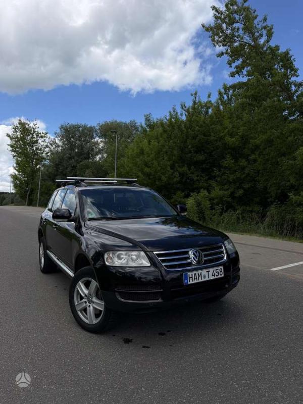 Melns Volkswagen Touareg 2006 Viļņa, ar dzinēja tilpumu 2.97 L un nobraukumu 270 tūkst. km par 4950 €, foto 5 vietnē AUTOMOTO.COM.LV