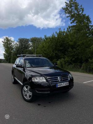 Black Volkswagen Touareg 2006 in Vilnius, with an engine capacity of 2.97 L and mileage of 270 thousand km for 4950 €, photo 6 on AUTOMOTO.COM.LV