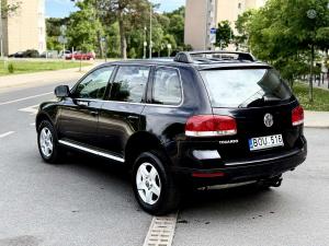 Black Volkswagen Touareg 2006 in Vilnius, with an engine capacity of 2.50 L and mileage of 332 thousand km for 1900 €, photo 6 on AUTOMOTO.COM.LV