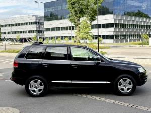 Black Volkswagen Touareg 2006 in Vilnius, with an engine capacity of 2.50 L and mileage of 332 thousand km for 1900 €, photo 9 on AUTOMOTO.COM.LV