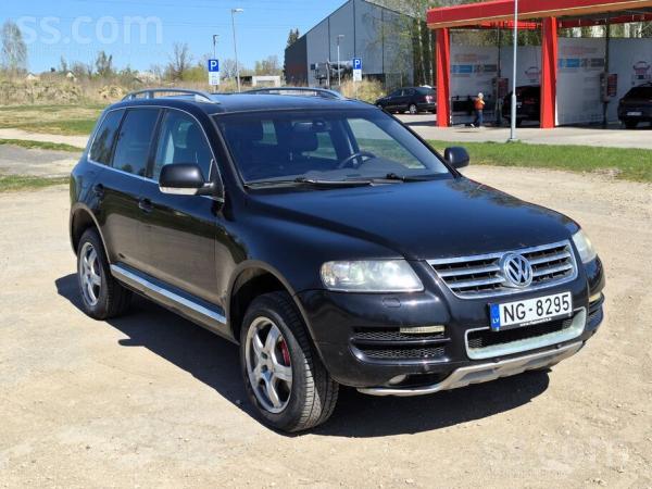 Black Volkswagen Touareg 2006 in Jelgava, with an engine capacity of 3.00 L and mileage of 399 thousand km for 2700 €, photo 1 on AUTOMOTO.COM.LV