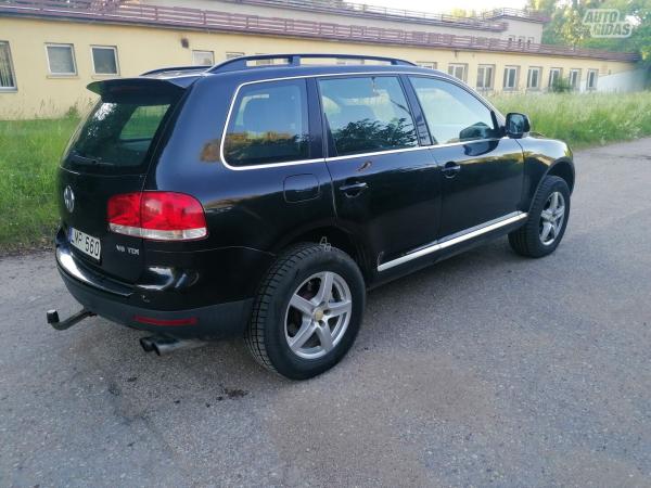 Melns Volkswagen Touareg 2006 Utena, ar dzinēja tilpumu 3.00 L un nobraukumu 290 tūkst. km par 3500 €, foto 5 vietnē AUTOMOTO.COM.LV