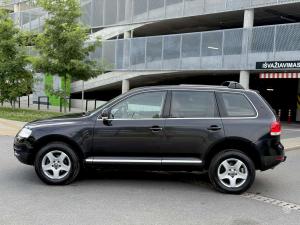 Black Volkswagen Touareg 2006 in Vilnius, with an engine capacity of 0.00 L and mileage of 312 thousand km for 2000 €, photo 5 on AUTOMOTO.COM.LV