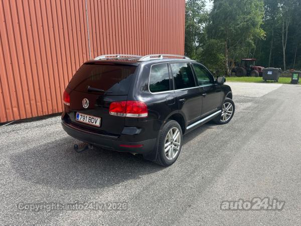 Melns Volkswagen Touareg 2006 Tallina, ar dzinēja tilpumu 2.50 L un nobraukumu 354 tūkst. km par 2500 €, foto 4 vietnē AUTOMOTO.COM.LV
