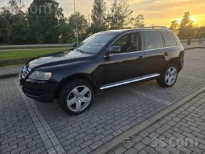 Black Volkswagen Touareg 2006 in Ventspils, with an engine capacity of 2.50 L and mileage of 342 thousand km for 1850 €, photo  on AUTOMOTO.COM.LV