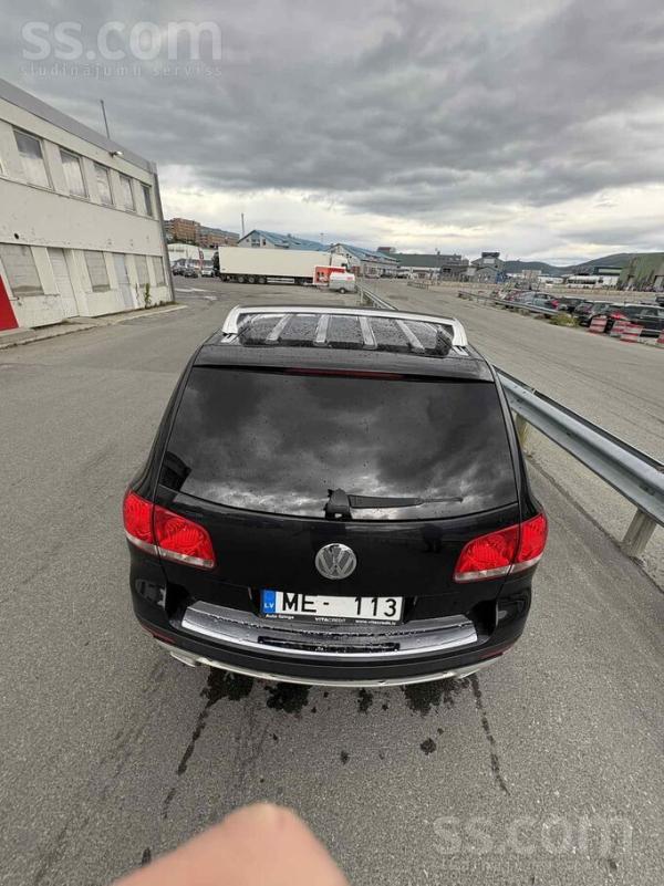 Melns Volkswagen Touareg 2006 Liepāja, ar dzinēja tilpumu 3.00 L un nobraukumu 319 tūkst. km par 3600 €, foto 6 vietnē AUTOMOTO.COM.LV