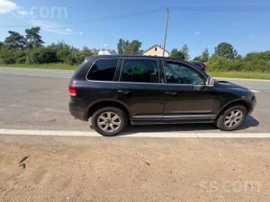 Melns Volkswagen Touareg 2006 Liepāja, ar dzinēja tilpumu 3.00 L un nobraukumu 319 tūkst. km par 3600 €, foto 11 vietnē AUTOMOTO.COM.LV