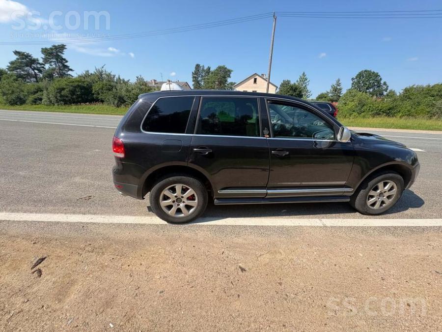 Melns Volkswagen Touareg 2006 Liepāja, ar dzinēja tilpumu 3.00 L un nobraukumu 319 tūkst. km par 3600 €, foto 11 vietnē AUTOMOTO.COM.LV