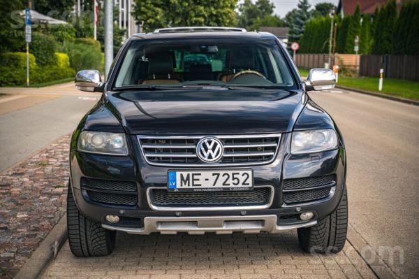 Black Volkswagen Touareg 2006 in Riga, with an engine capacity of 3.00 L and mileage of 0 thousand km for 3990 €, photo 2 on AUTOMOTO.COM.LV