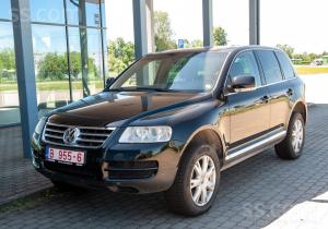 Black Volkswagen Touareg 2006 in Cesis, with an engine capacity of 2.50 L and mileage of 237 thousand km for 4300 €, photo  on AUTOMOTO.COM.LV