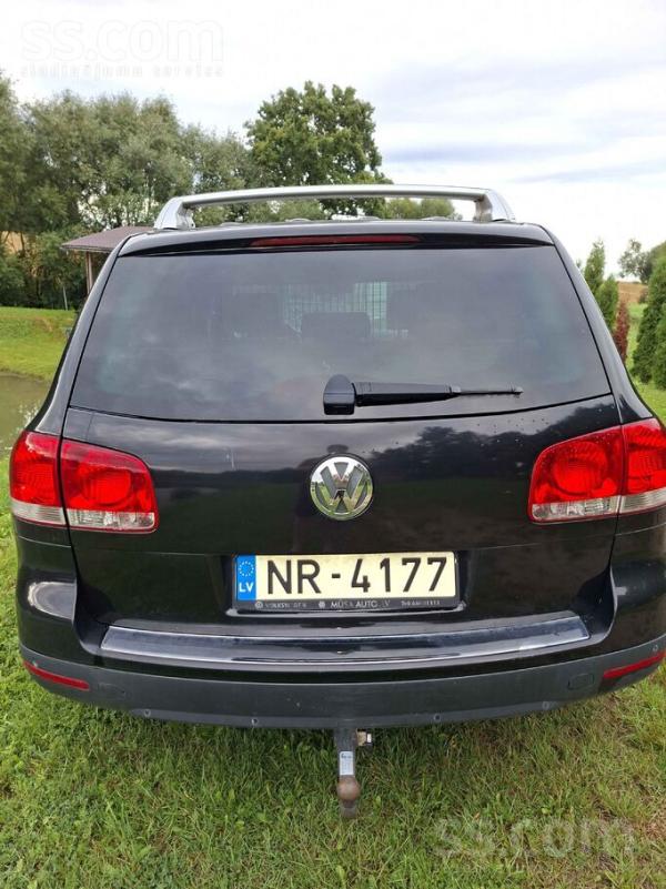 Black Volkswagen Touareg 2006 in Bauska, with an engine capacity of 3.00 L and mileage of 329 thousand km for 2800 €, photo 3 on AUTOMOTO.COM.LV