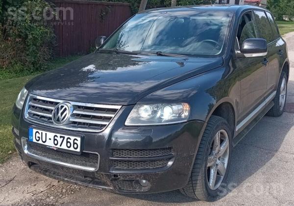 Black Volkswagen Touareg 2006 in Riga, with an engine capacity of 3.00 L and mileage of 0 thousand km for 2300 €, photo 7 on AUTOMOTO.COM.LV