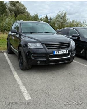 Black Volkswagen Touareg 2006 in Tallinn, with an engine capacity of 6.00 L and mileage of 263 thousand km for 5900 €, photo 3 on AUTOMOTO.COM.LV