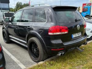 Black Volkswagen Touareg 2006 in Tallinn, with an engine capacity of 6.00 L and mileage of 263 thousand km for 5900 €, photo 4 on AUTOMOTO.COM.LV