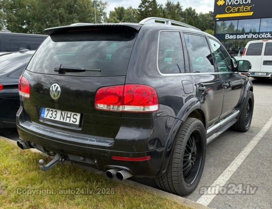 Black Volkswagen Touareg 2006 in Tallinn, with an engine capacity of 6.00 L and mileage of 263 thousand km for 5900 €, photo 5 on AUTOMOTO.COM.LV
