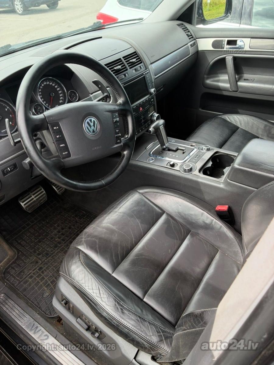 Black Volkswagen Touareg 2006 in Tallinn, with an engine capacity of 6.00 L and mileage of 263 thousand km for 5900 €, photo 6 on AUTOMOTO.COM.LV