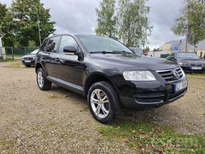 Black Volkswagen Touareg 2006 in Rezekne, with an engine capacity of 3.00 L and mileage of 0 thousand km for 3950 €, photo 5 on AUTOMOTO.COM.LV