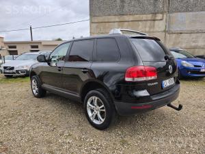 Black Volkswagen Touareg 2006 in Rezekne, with an engine capacity of 3.00 L and mileage of 0 thousand km for 3950 €, photo 7 on AUTOMOTO.COM.LV