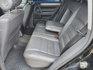 Black Volkswagen Touareg 2006 in Rezekne, with an engine capacity of 3.00 L and mileage of 0 thousand km for 3950 €, photo 23 on AUTOMOTO.COM.LV