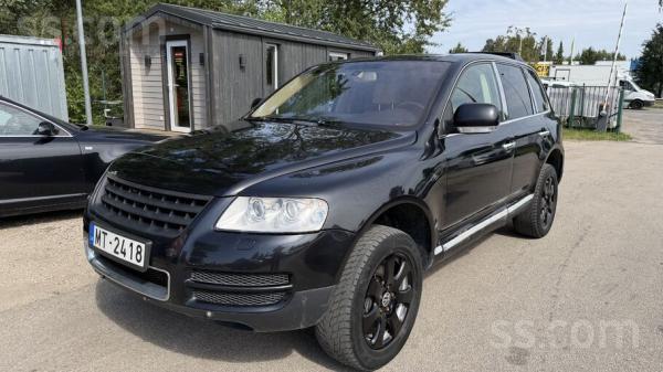 Melns Volkswagen Touareg 2006 Rīga, ar dzinēja tilpumu 3.00 L un nobraukumu 322 tūkst. km par 2000 €, foto 1 vietnē AUTOMOTO.COM.LV