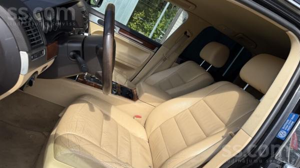 Melns Volkswagen Touareg 2006 Rīga, ar dzinēja tilpumu 3.00 L un nobraukumu 322 tūkst. km par 2000 €, foto 6 vietnē AUTOMOTO.COM.LV