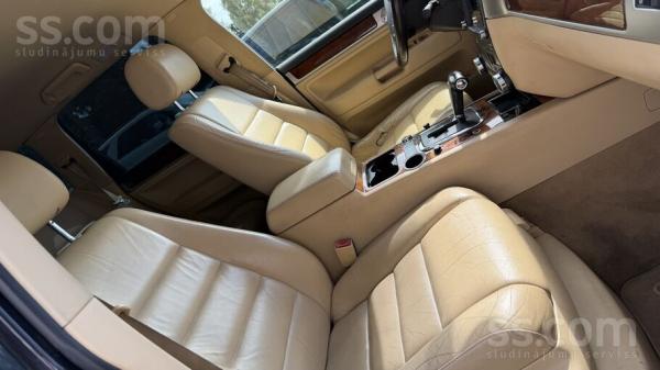 Melns Volkswagen Touareg 2006 Rīga, ar dzinēja tilpumu 3.00 L un nobraukumu 322 tūkst. km par 2000 €, foto 7 vietnē AUTOMOTO.COM.LV