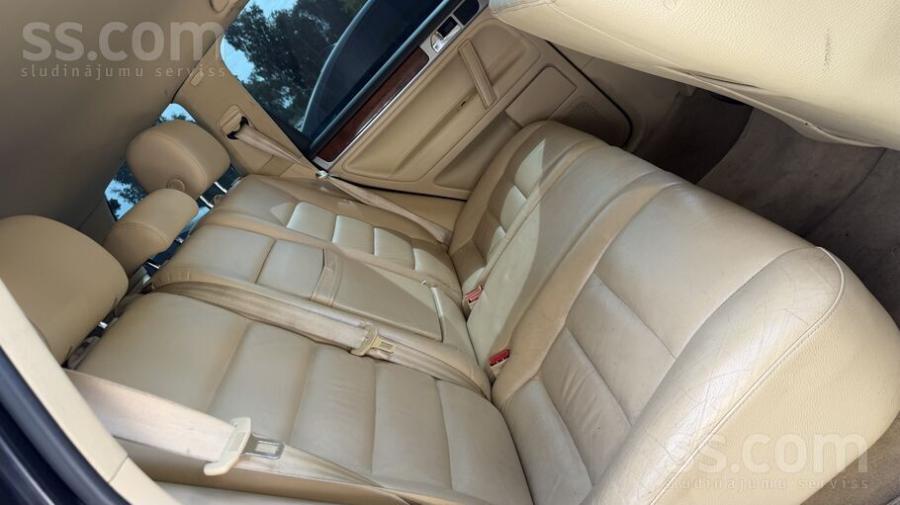 Black Volkswagen Touareg 2006 in Riga, with an engine capacity of 3.00 L and mileage of 322 thousand km for 2000 €, photo 9 on AUTOMOTO.COM.LV