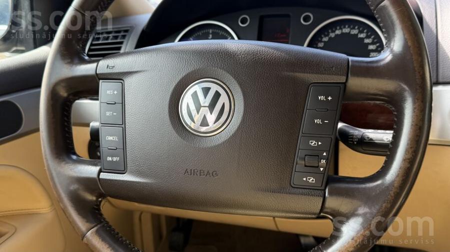 Black Volkswagen Touareg 2006 in Riga, with an engine capacity of 3.00 L and mileage of 322 thousand km for 2000 €, photo 13 on AUTOMOTO.COM.LV