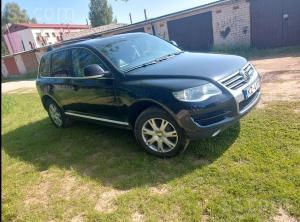 Black Volkswagen Touareg 2007 in Limbazi, with an engine capacity of 3.00 L and mileage of 324 thousand km for 5000 €, photo 3 on AUTOMOTO.COM.LV