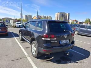 Melns Volkswagen Touareg 2007 Rīga, ar dzinēja tilpumu 2.50 L un nobraukumu 340 tūkst. km par 5150 €, foto 2 vietnē AUTOMOTO.COM.LV