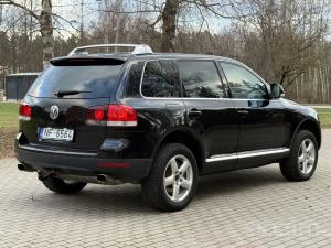 Melns Volkswagen Touareg 2007 Rīga, ar dzinēja tilpumu 3.00 L un nobraukumu 392 tūkst. km par 3950 €, foto 3 vietnē AUTOMOTO.COM.LV
