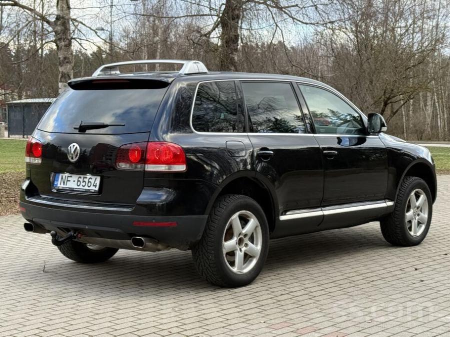 Melns Volkswagen Touareg 2007 Rīga, ar dzinēja tilpumu 3.00 L un nobraukumu 392 tūkst. km par 3950 €, foto 3 vietnē AUTOMOTO.COM.LV