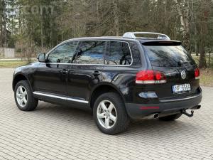 Melns Volkswagen Touareg 2007 Rīga, ar dzinēja tilpumu 3.00 L un nobraukumu 392 tūkst. km par 3950 €, foto 4 vietnē AUTOMOTO.COM.LV