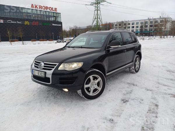Black Volkswagen Touareg 2007 in Riga, with an engine capacity of 3.00 L and mileage of 261 thousand km for 6200 €, photo 1 on AUTOMOTO.COM.LV