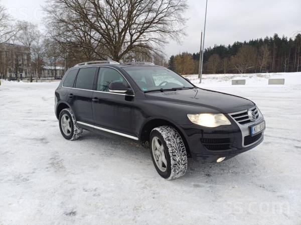 Black Volkswagen Touareg 2007 in Riga, with an engine capacity of 3.00 L and mileage of 261 thousand km for 6200 €, photo 2 on AUTOMOTO.COM.LV