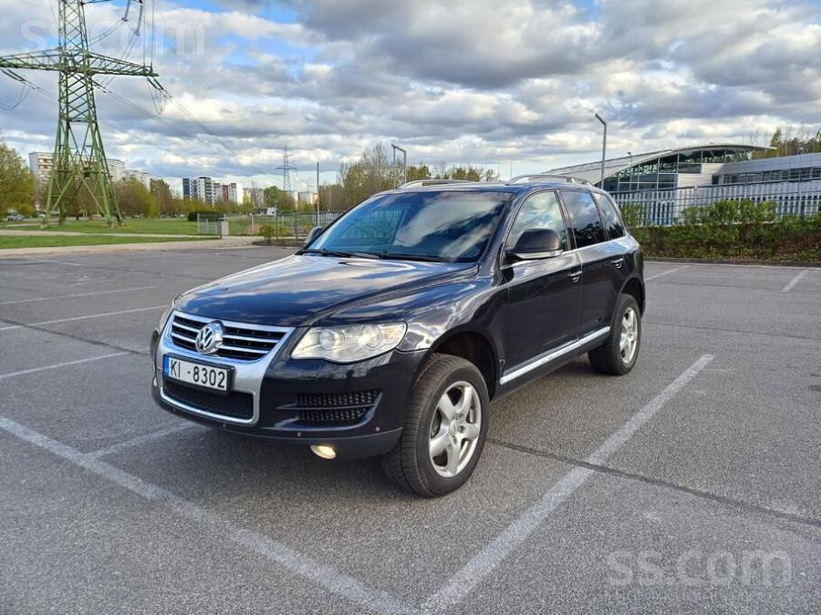 Black Volkswagen Touareg 2007 in Riga, with an engine capacity of 3.00 L and mileage of 261 thousand km for 6200 €, photo 12 on AUTOMOTO.COM.LV