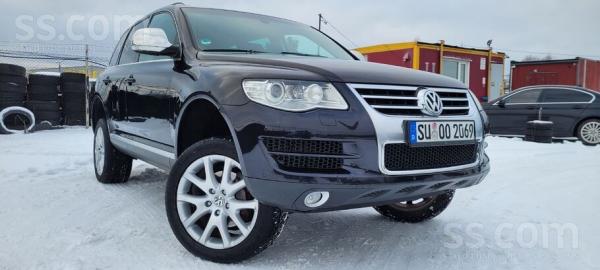 Black Volkswagen Touareg 2007 in Riga, with an engine capacity of 3.00 L and mileage of 0 thousand km for 6900 €, photo 1 on AUTOMOTO.COM.LV