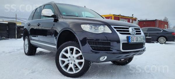 Black Volkswagen Touareg 2007 in Riga, with an engine capacity of 3.00 L and mileage of 0 thousand km for 6900 €, photo 2 on AUTOMOTO.COM.LV