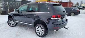 Black Volkswagen Touareg 2007 in Riga, with an engine capacity of 3.00 L and mileage of 0 thousand km for 6900 €, photo 7 on AUTOMOTO.COM.LV