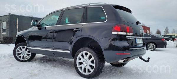 Black Volkswagen Touareg 2007 in Riga, with an engine capacity of 3.00 L and mileage of 0 thousand km for 6900 €, photo 8 on AUTOMOTO.COM.LV