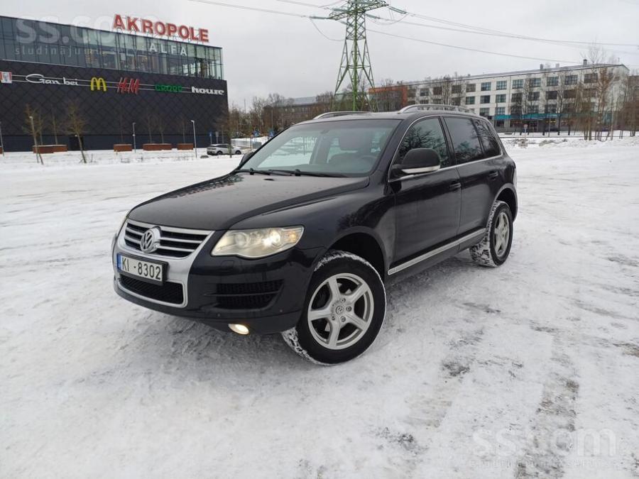 Melns Volkswagen Touareg 2007 Rīga, ar dzinēja tilpumu 3.00 L un nobraukumu 261 tūkst. km par 5500 €, foto 1 vietnē AUTOMOTO.COM.LV