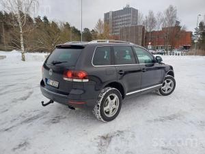 Melns Volkswagen Touareg 2007 Rīga, ar dzinēja tilpumu 3.00 L un nobraukumu 261 tūkst. km par 5500 €, foto 3 vietnē AUTOMOTO.COM.LV