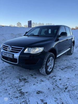 Black Volkswagen Touareg 2007 in Vilnius, with an engine capacity of 2.46 L and mileage of 263 thousand km for 350 €, photo 6 on AUTOMOTO.COM.LV