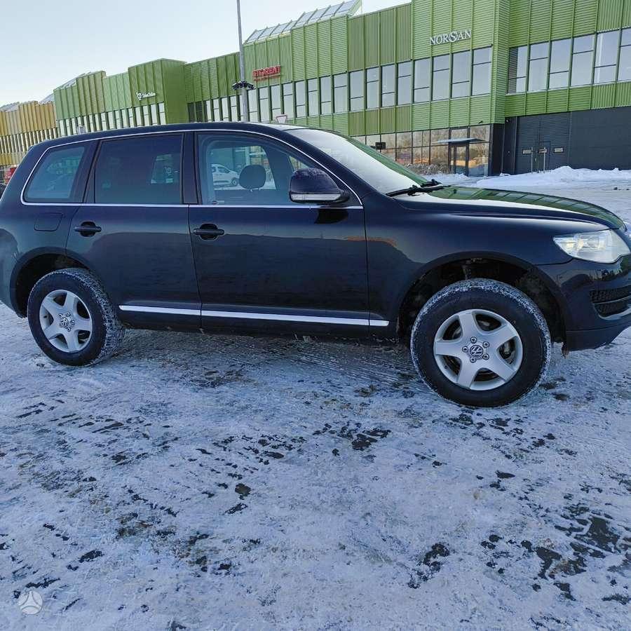 Black Volkswagen Touareg 2007 in Vilnius, with an engine capacity of 2.46 L and mileage of 263 thousand km for 350 €, photo 11 on AUTOMOTO.COM.LV