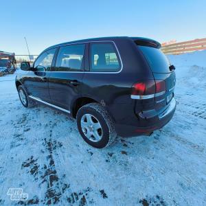 Black Volkswagen Touareg 2007 in Vilnius, with an engine capacity of 2.50 L and mileage of 263 thousand km for 3500 €, photo 13 on AUTOMOTO.COM.LV