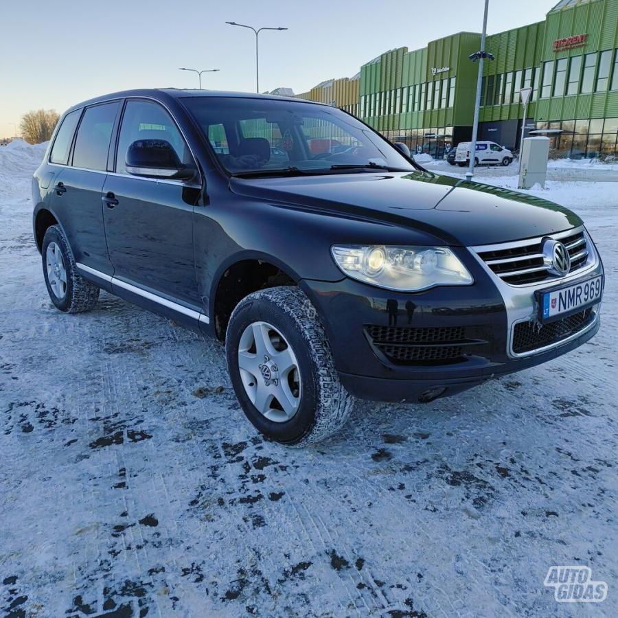 Black Volkswagen Touareg 2007 in Vilnius, with an engine capacity of 2.50 L and mileage of 263 thousand km for 3500 €, photo 15 on AUTOMOTO.COM.LV