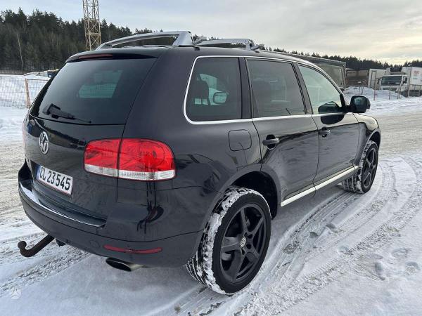 Black Volkswagen Touareg 2007 in Vilnius, with an engine capacity of 4.92 L and mileage of 284 thousand km for 2999 €, photo 4 on AUTOMOTO.COM.LV