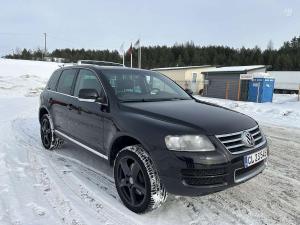 Black Volkswagen Touareg 2007 in Vilnius, with an engine capacity of 4.92 L and mileage of 284 thousand km for 2999 €, photo 5 on AUTOMOTO.COM.LV