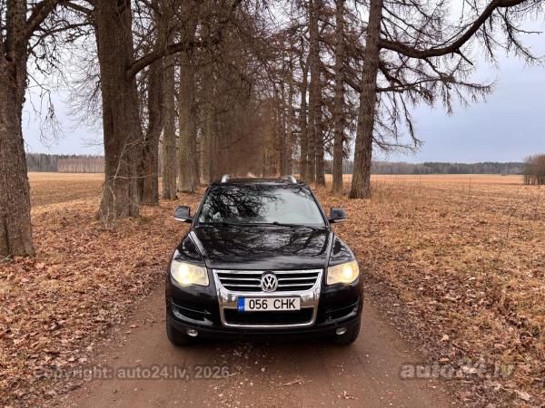 Black Volkswagen Touareg 2007 in Tallinn, with an engine capacity of 3.00 L and mileage of 0 thousand km for 6000 €, photo 2 on AUTOMOTO.COM.LV